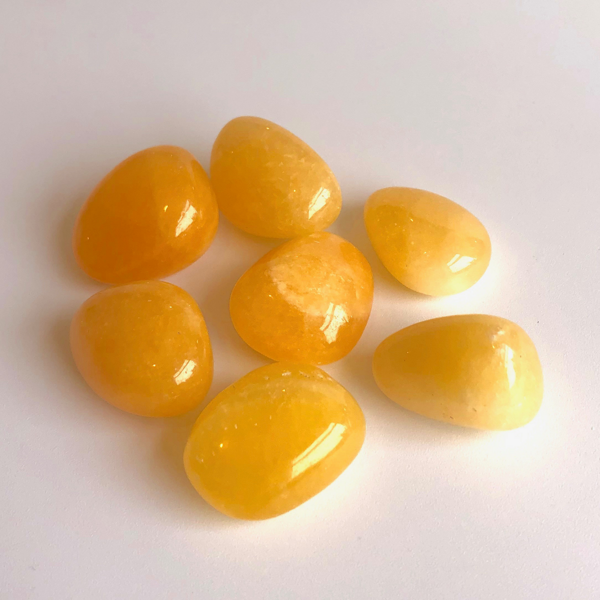 Orange Calcite Tumbled Stone – Crystal Cave and Serenity